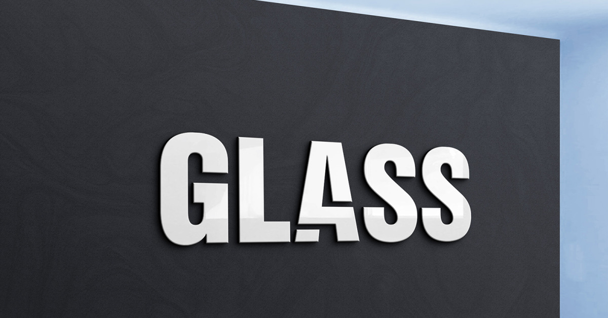 White Glass Logo Mockup on Company Wall - TemplateMonster