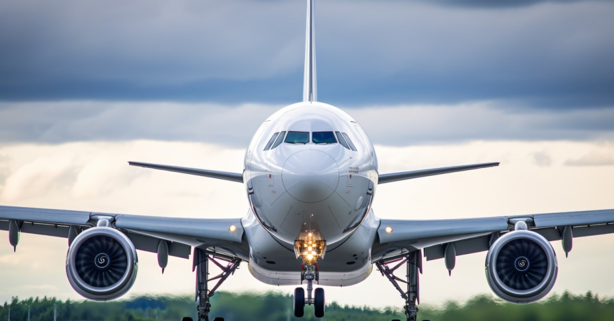 Full wings front view of a Airbus, airline landing 250